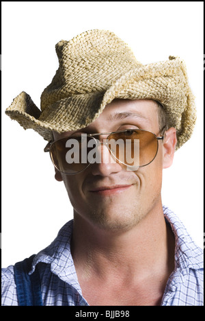 Farmer wearing a straw hat with sunglasses Stock Photo - Alamy