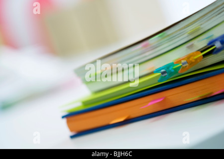 Notebooks with color coded tabs Stock Photo - Alamy