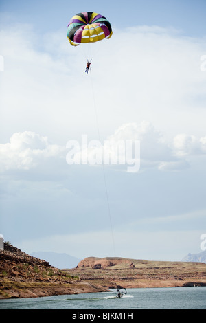 A low angle shot of floating clouds over rural mountains in ...