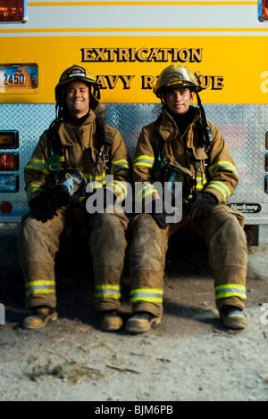 Portrait of two firefighters Stock Photo - Alamy