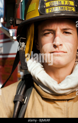 Portrait of a firefighter smiling Stock Photo - Alamy