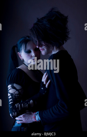 Couple man and woman standing pensively leaning on the railing of the ...