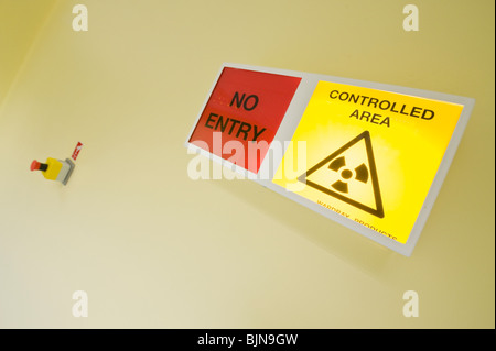 Radiation sign in a hospital unit UK Stock Photo - Alamy