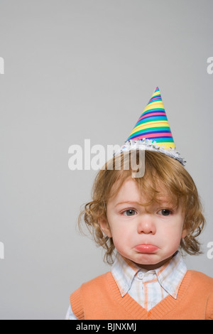 Crying birthday boy Stock Photo - Alamy