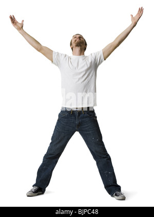 Man (MODEL RELEASED) with open arms on Rock Outcrop high above Peyto ...