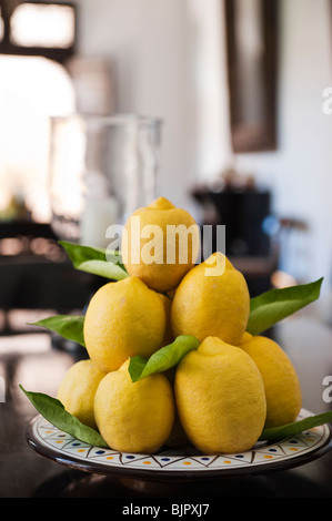 Fresh lemons on market table, top view Stock Photo - Alamy