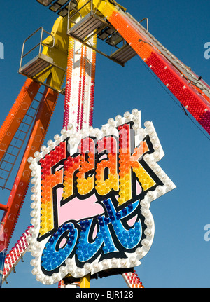 Freak Out fair and carnival ride in a motion of color Stock Photo - Alamy