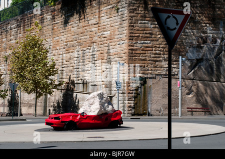 Public art showing a car smashed by a rock, the Rocks, Sydney ...