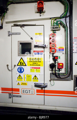 factory safety warning signs in the UK Stock Photo - Alamy