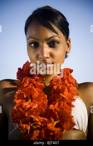 African-American woman with a red lei Stock Photo - Alamy