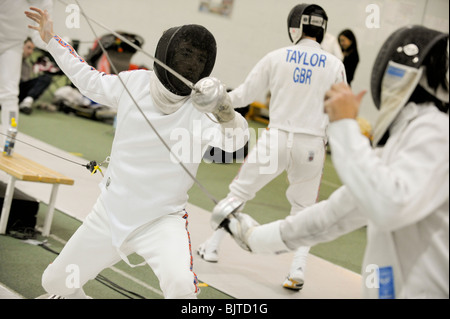 Aspiring members of the UK fencing team take part in a fencing ...