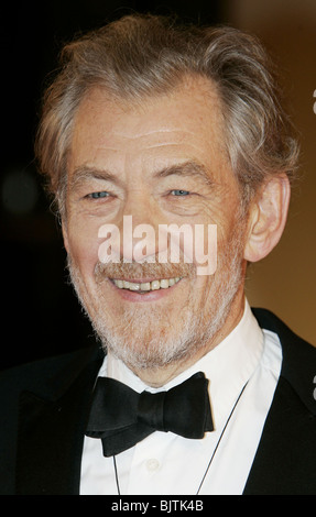 British actor Sir Ian McKellen with a new portrait of himself by Clive ...