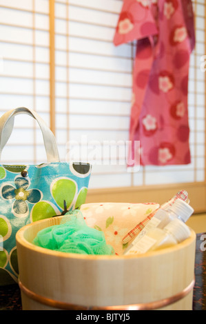 Bamboo bucket of bath products in a health spa Stock Photo - Alamy