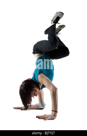 Young women in handstand breakdancing freeze against graffiti Stock ...