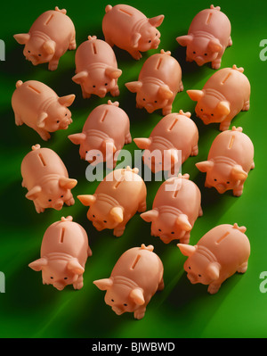 Piggy banks with coins. Currency saving and investments concept Stock ...