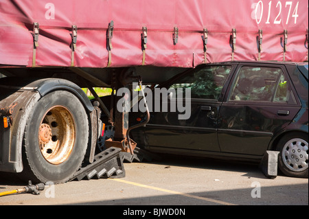 Car crashed under trailer of HGV Lorry Stock Photo - Alamy