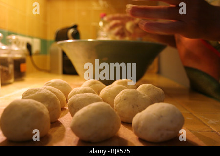 Knödel, German dumplings, are prepared before being boiled Stock Photo ...