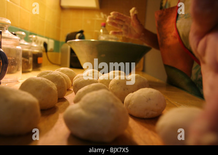 Knödel, German dumplings, are prepared before being boiled Stock Photo ...