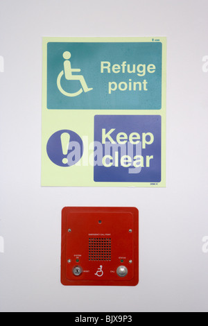 Modern fire call point on color background Stock Photo - Alamy
