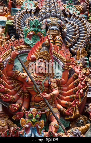 Hindu god with many arms at the Meenakshi Temple, India; Madurai, India ...