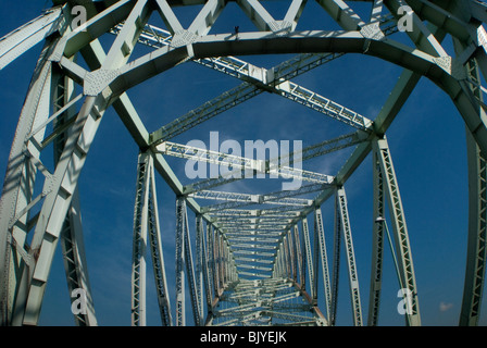 The steel girders in a cobweb shape for the single arch Runcorn Bridge ...