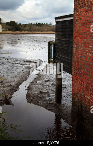 stilt house extension over the Beaulieu River and mud flats with ...