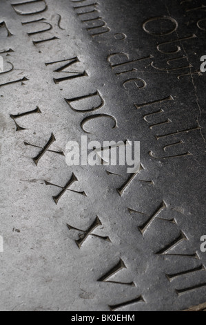Roman numerals carved on stone wall Stock Photo - Alamy