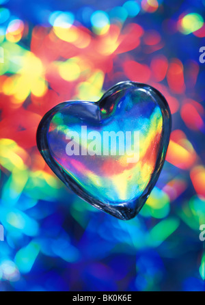 Valentines Day Concept. Glass transparent hearts on pink background ...