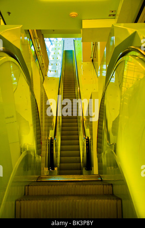 Bright yellow escalator inside the downtown branch of Seattle Public ...