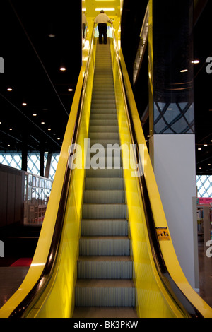 Bright yellow escalator inside the downtown branch of Seattle Public ...