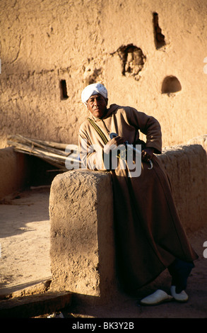 Full-length portrait of a Moroccan man wearing traditional clothing in ...