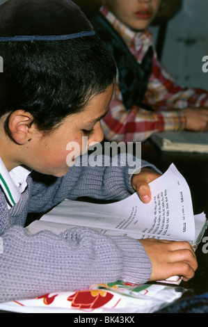 4 religious Jewish students studying Talmud at Lubavitch headquarters ...