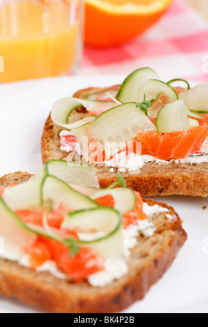 Toast with vegetables and fish Stock Photo - Alamy
