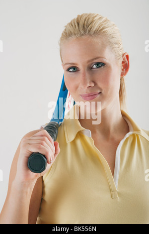 Beautiful blonde twenty year old girl, standing side on to show her trim stomach Stock Photo - Alamy