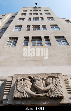 BBC Building Sculpture By Eric Gill Stock Photo - Alamy
