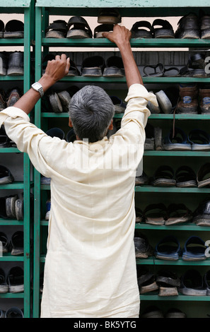 Muslim removing shoes in mosque Stock Photo - Alamy