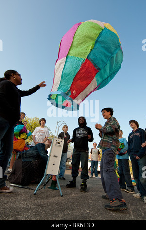 girls fly in class on the fly yoga Stock Photo - Alamy