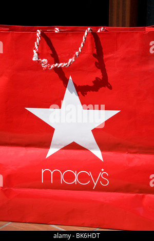 Red shopping paper bag with star pattern isolated on white Stock Photo ...
