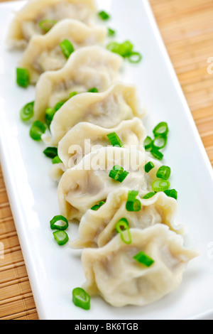 Chinese dumplings for dinner. Traditional Chinese cuisine Stock Photo ...