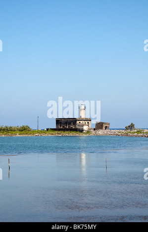 A lighthouse on the Laghetto di Lingua, or "little salt lake", in the ...