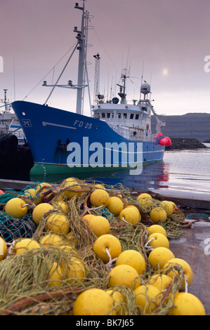 Trawler and fishing nets in Toftir harbour, Toftir, Eysturoy, Faroe ...
