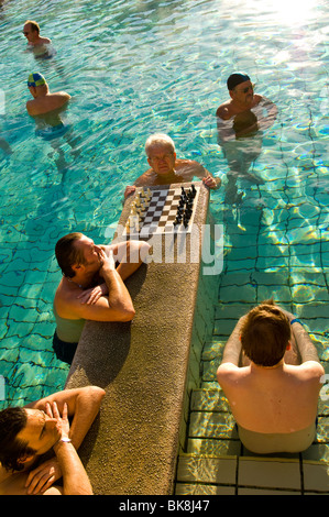 Men play chess in the pool in Szechenyi Spas, one of Europe's largest ...