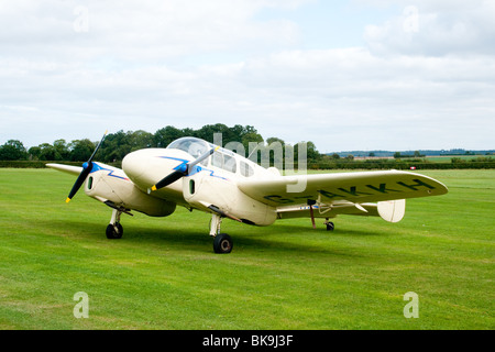 A Miles Gemini Twin Engined British Light aircraft, being refilled from ...