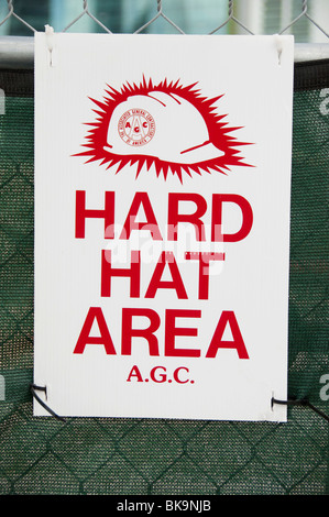 Warning signs of hard hat area on a construction site Stock Photo - Alamy