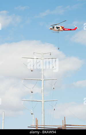 Helicopter with string line Stock Photo - Alamy