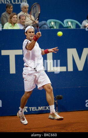 Spanish tennis player David Ferrer about to smash his racket against ...