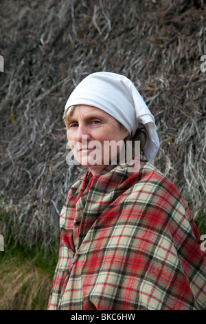 Actors, dressed in the traditional garb of peasants from the Joseon ...