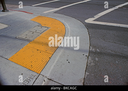 sidewalk disabled ramp at intersection corner Stock Photo - Alamy