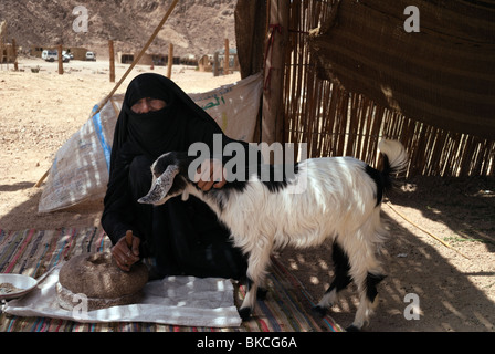 Bedouin woman with millstone Stock Photo - Alamy