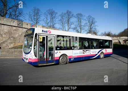 Single decker bus in first group livery driving through York city ...